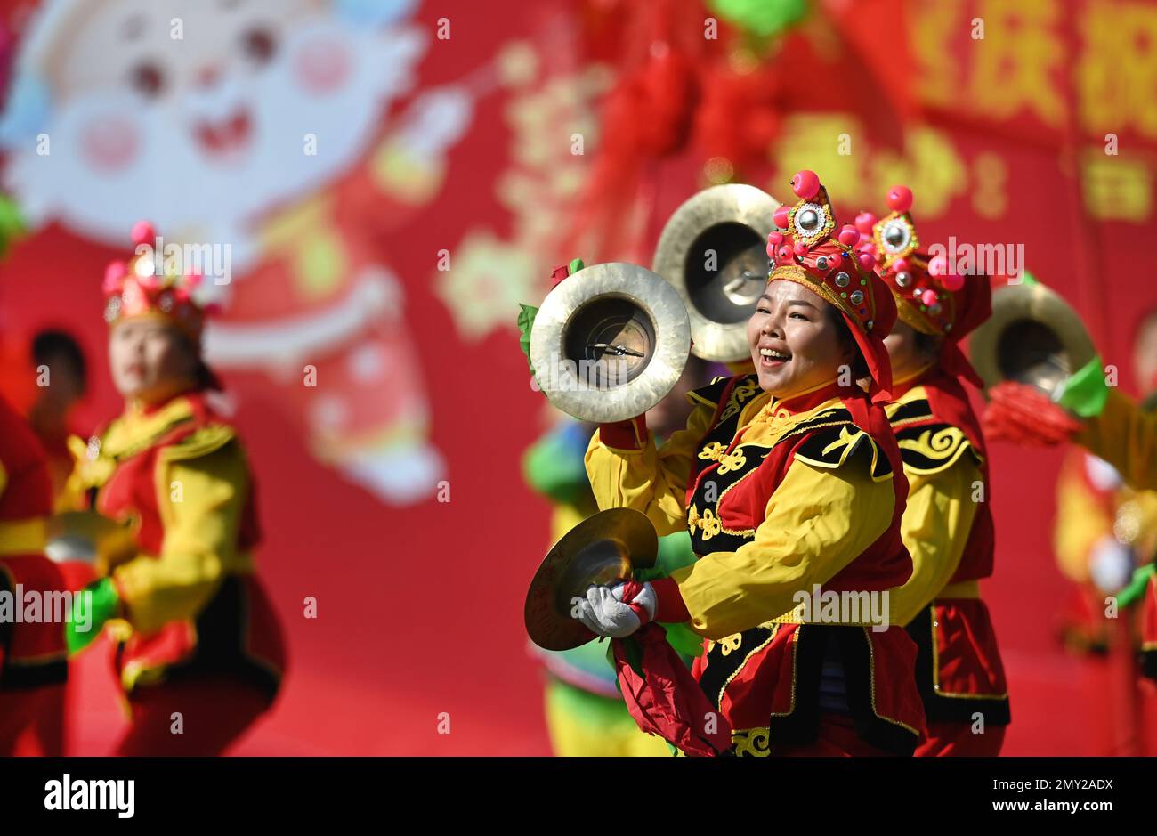 Weinan, China's Shaanxi Province. 4th Feb, 2023. Performers beat gongs ...