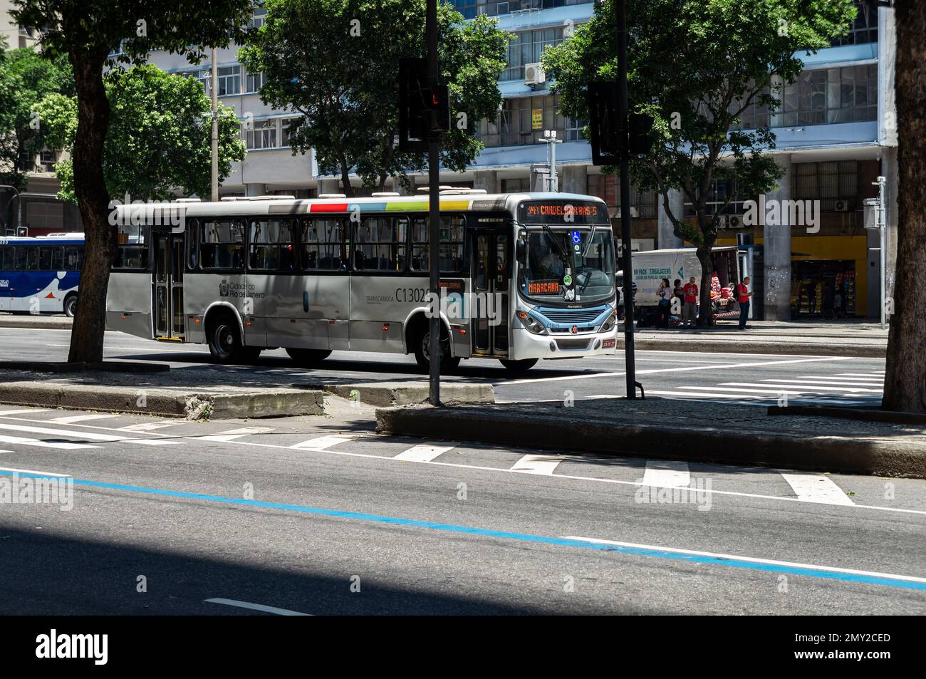 A city bus stopped at a red light on Presidente Vargas avenue nearby ...