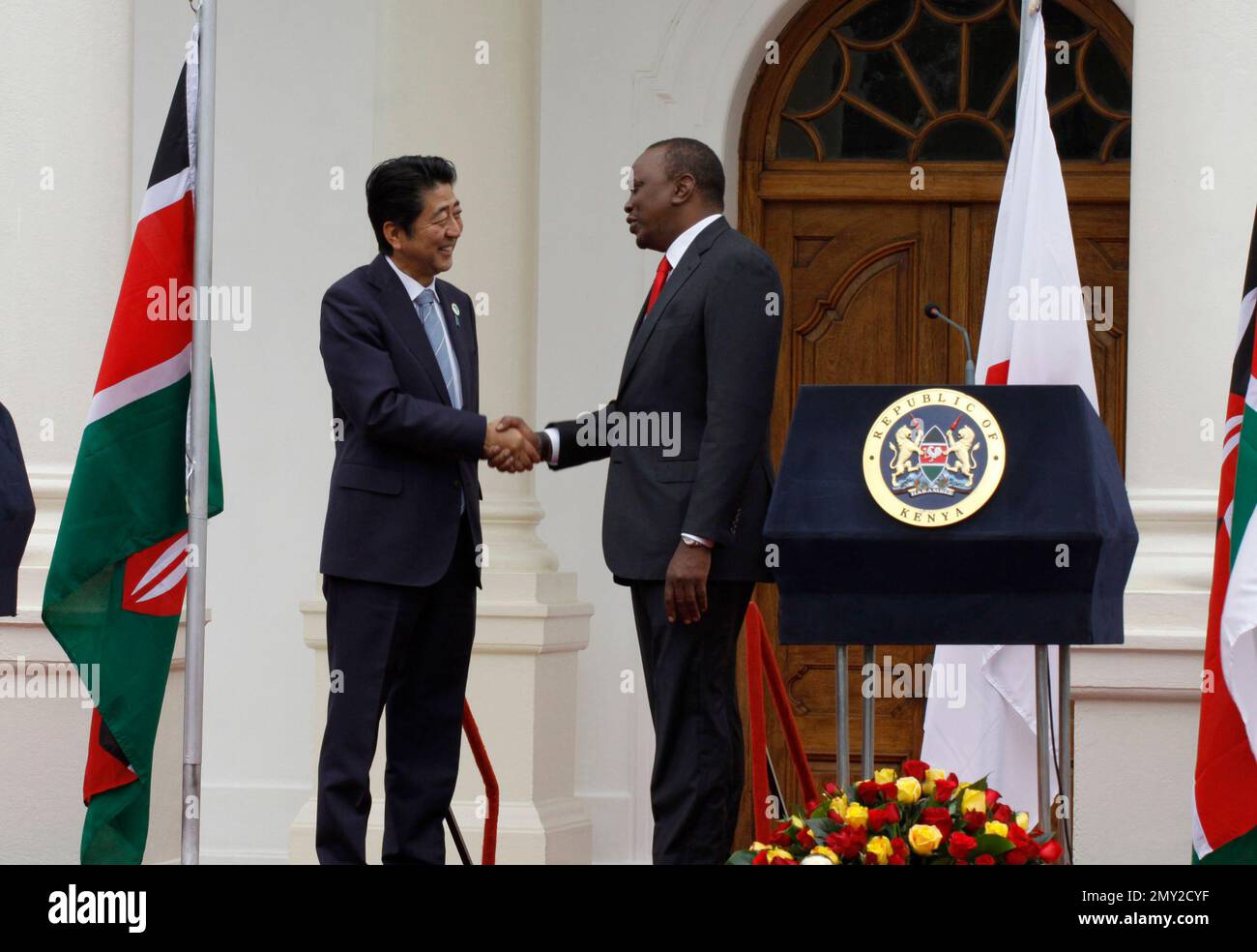 Japan's Prime Minister Shinzo Abe, left, and Kenyan President Uhuru ...