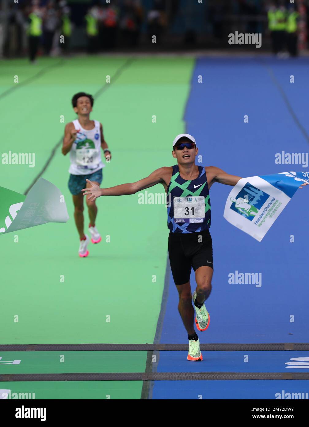 MenHH marathon champion Wong Kai-lok (front) and 1st runner-up Masashi ...