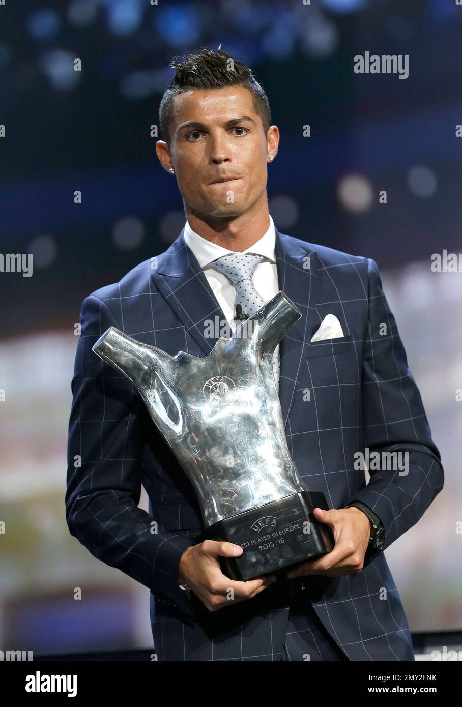 Real Madrid's forward Cristiano Ronaldo of Portugal, holds his trophy ...