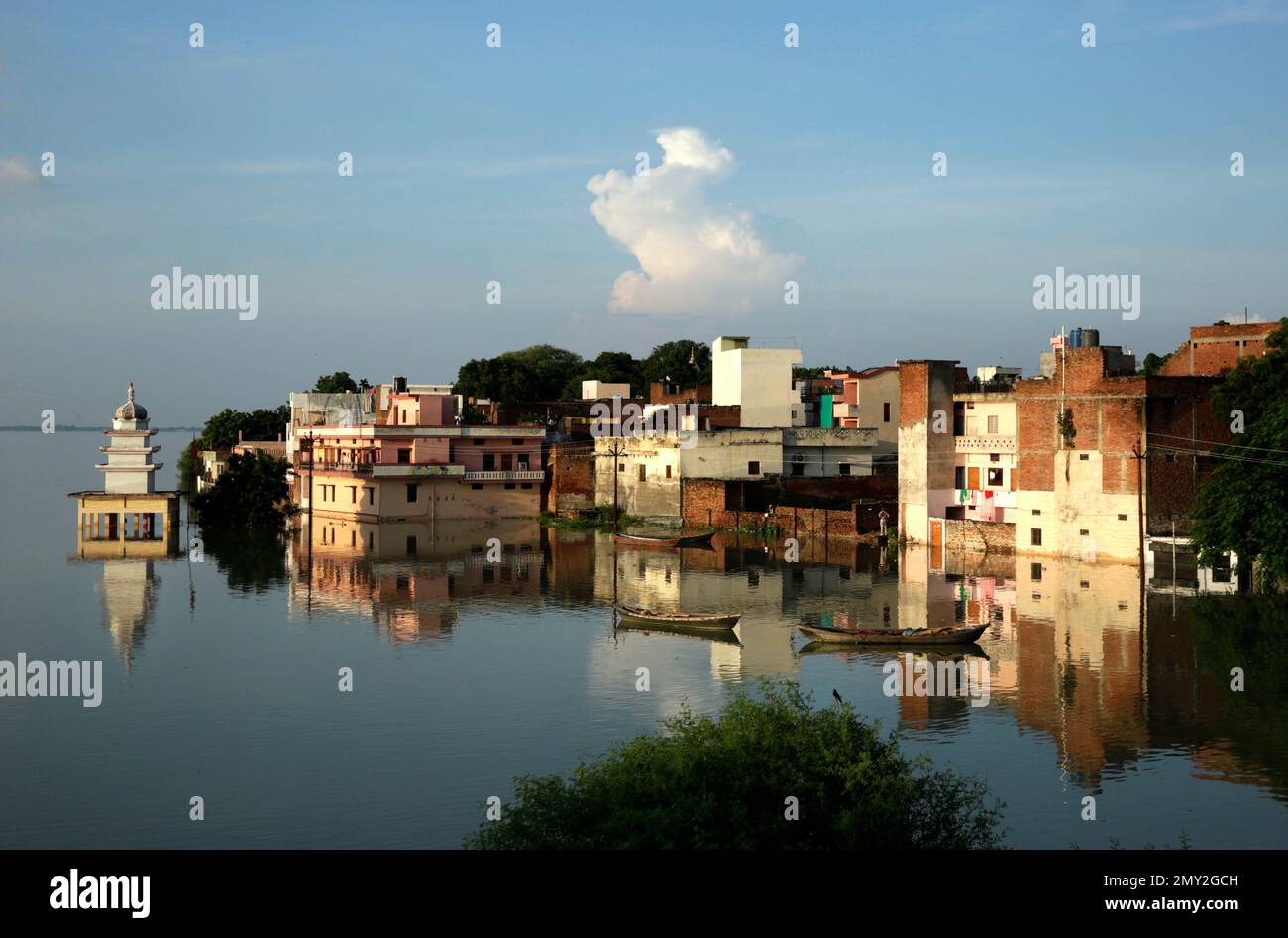 Houses are seen seen submerged in the flooded river Ganges in Allahabad ...