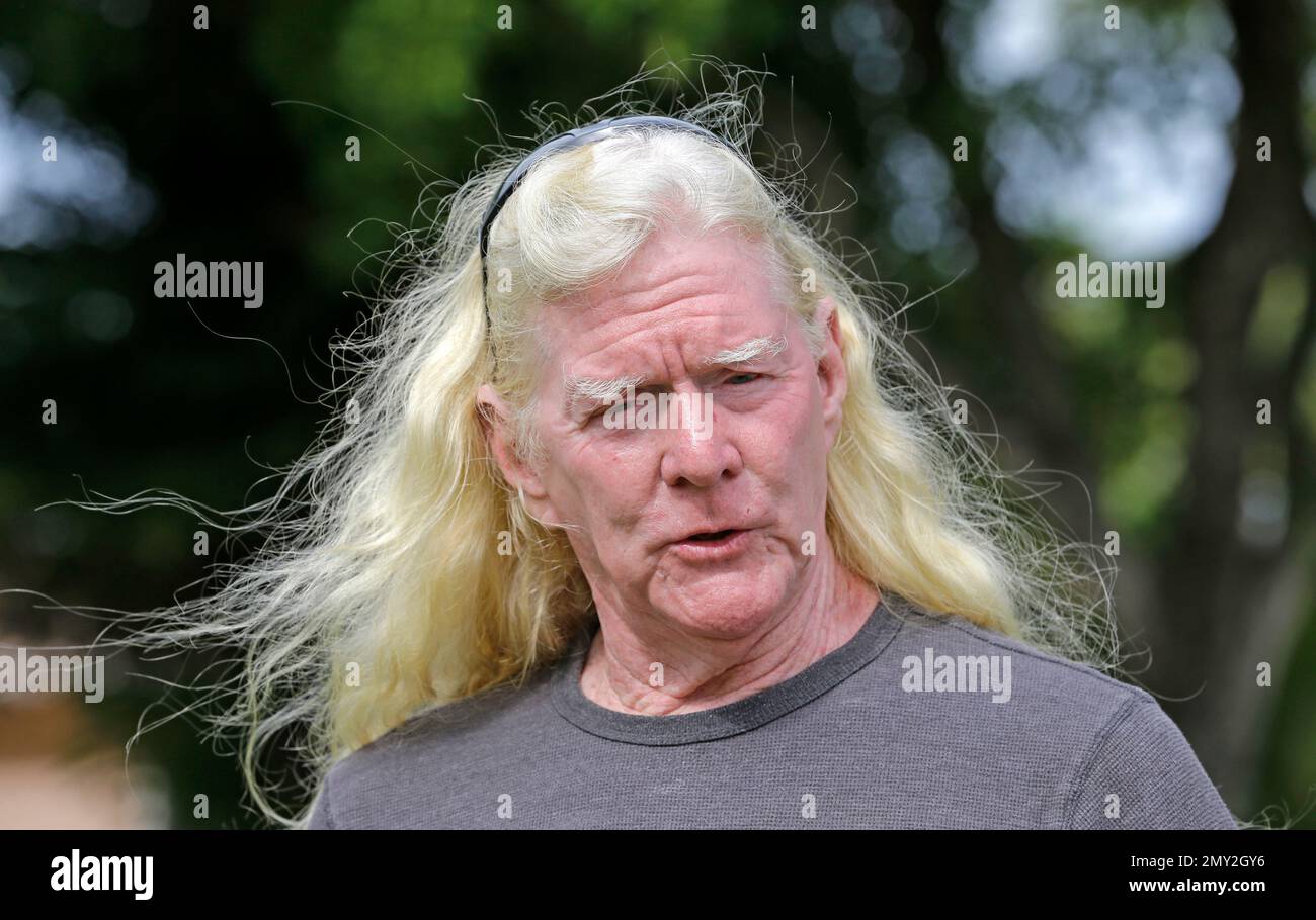 In this photo taken, Aug., 11, 2016, Mickey Munday talks to a reporter ...