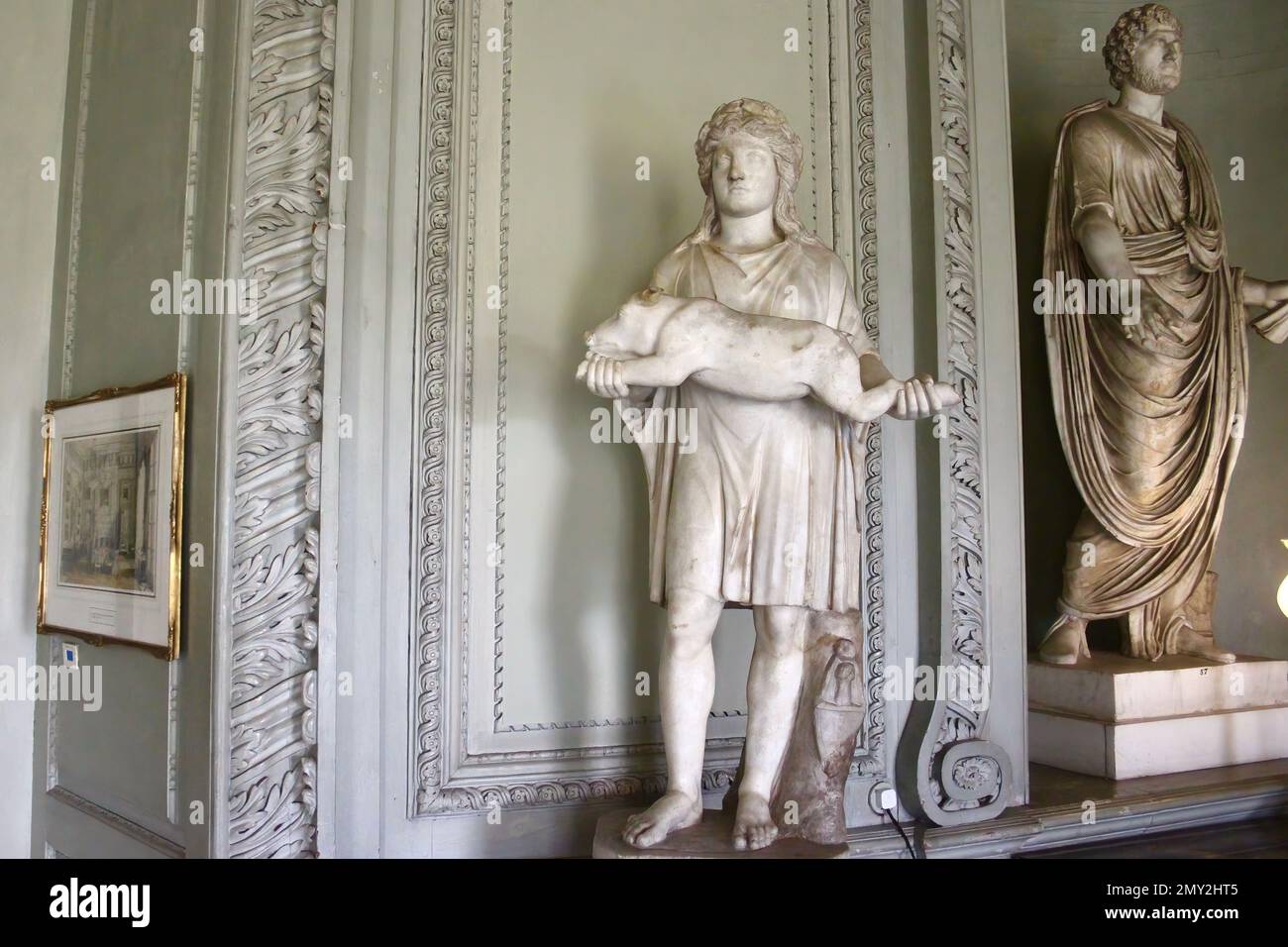 Roman statue of a Boy holding a Pig in parian marble Petworth House ...