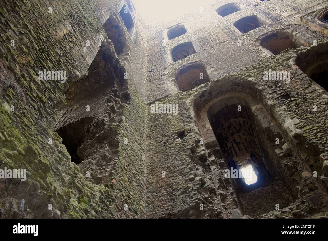 Inside the ruins of Rochester castle looking up at the stone structure ...