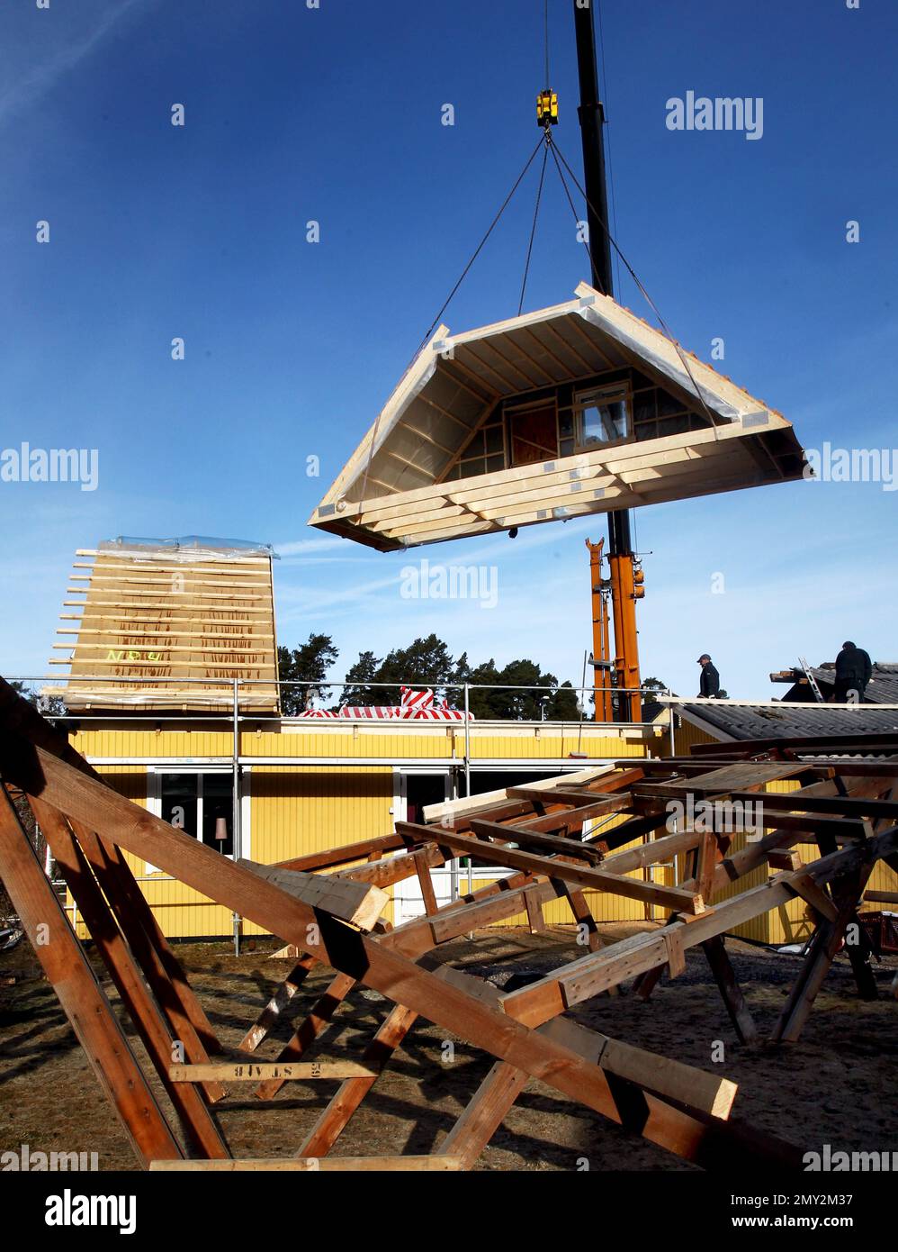 Some who are renovating a house and are going to build another floor on ...