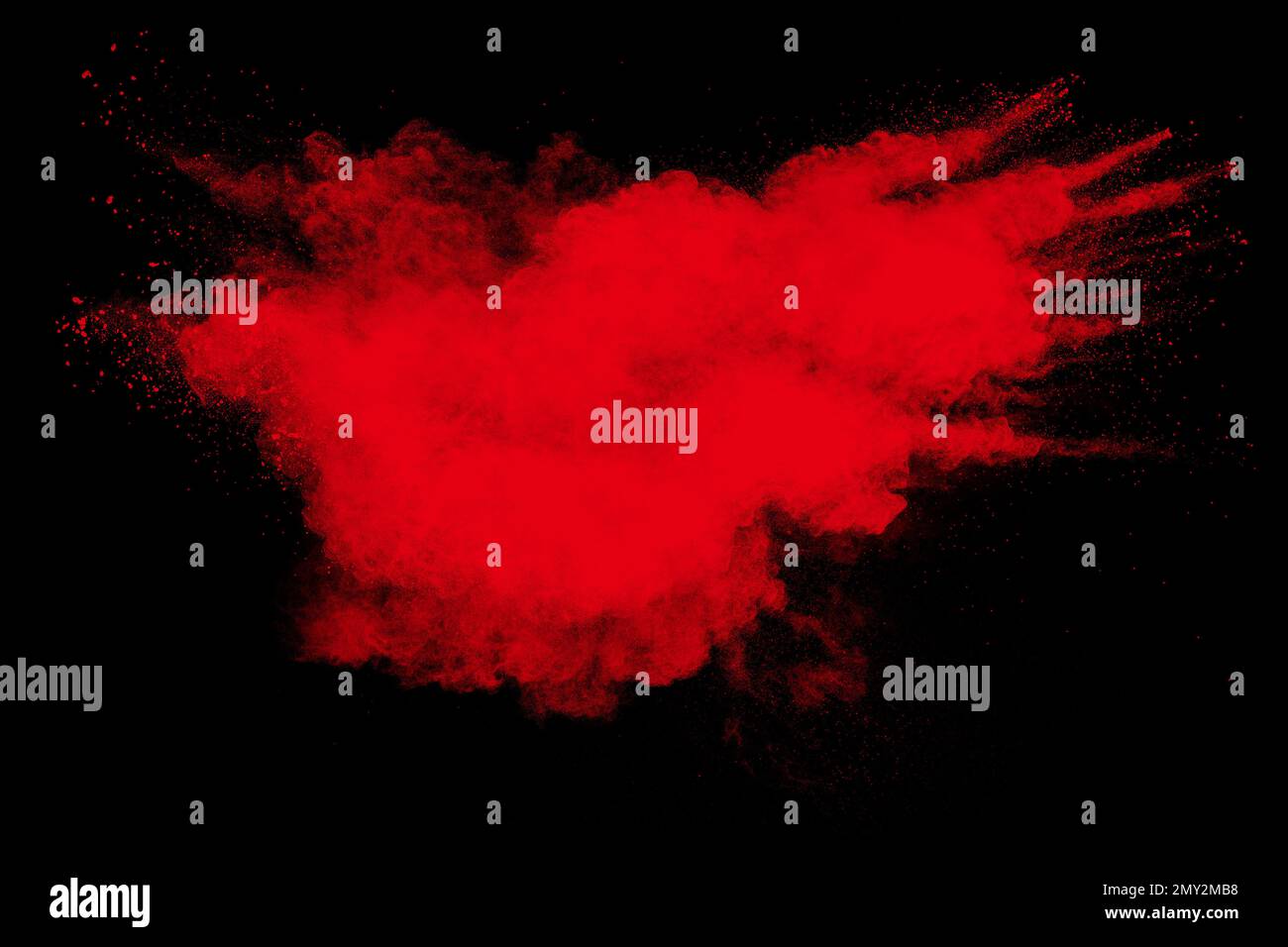 Red powder explosion cloud on black background. Freeze motion of red ...