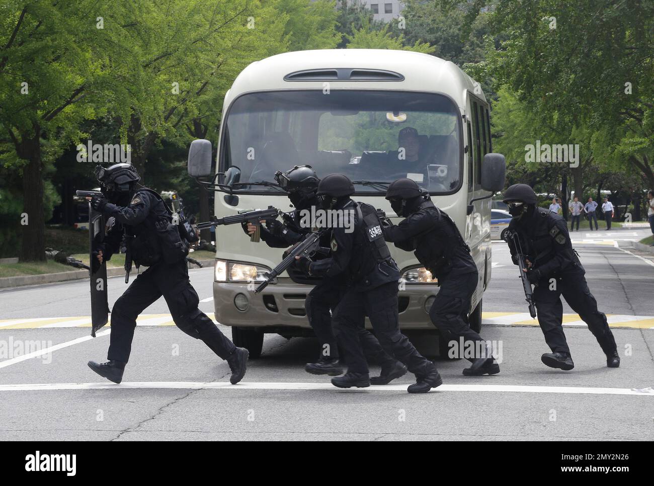 South Korean army soldiers run during an anti-terror drill as part of ...