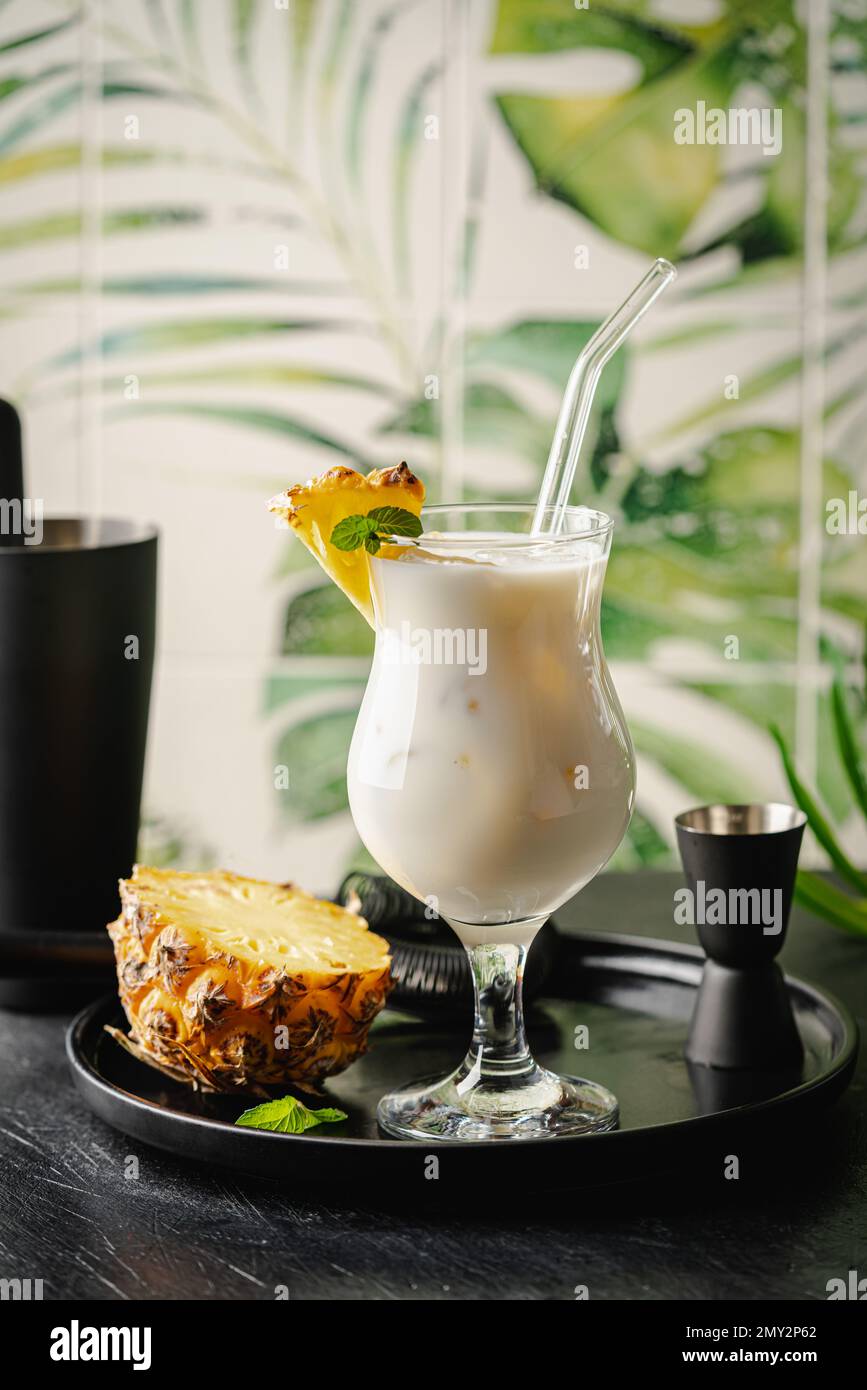 Traditional caribbean summer Pina Colada cocktail with rum, coconut ...