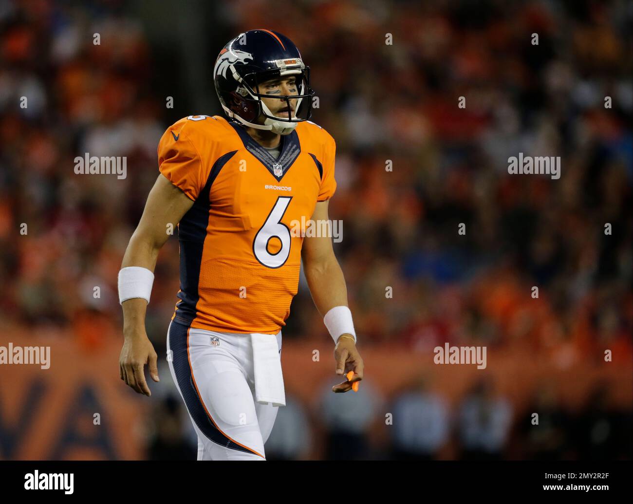 Denver Broncos quarterback Mark Sanchez walks on the field before a ...