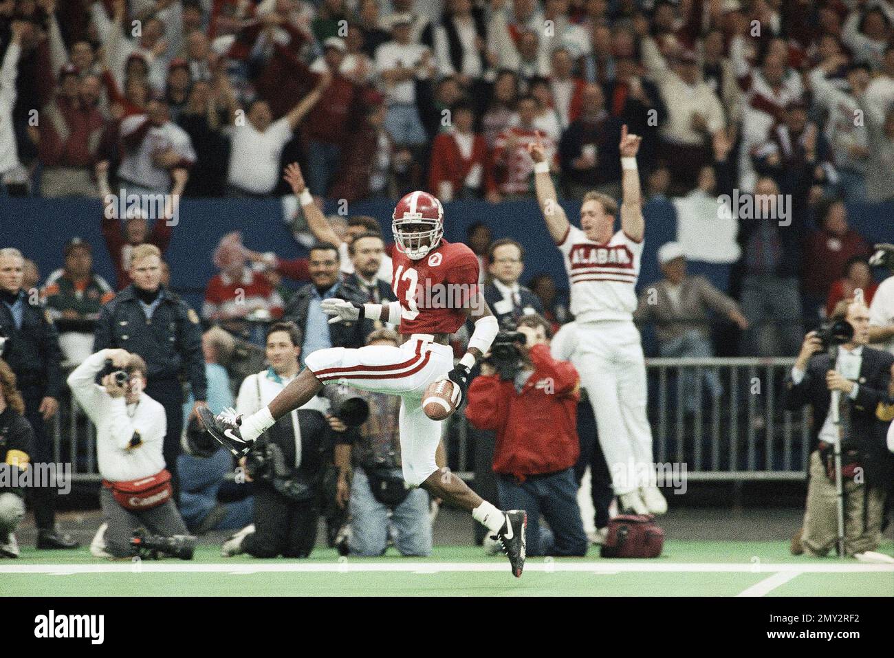 FILE - In this Jan. 1, 1993, file photo, an Alabama cheerleader ...