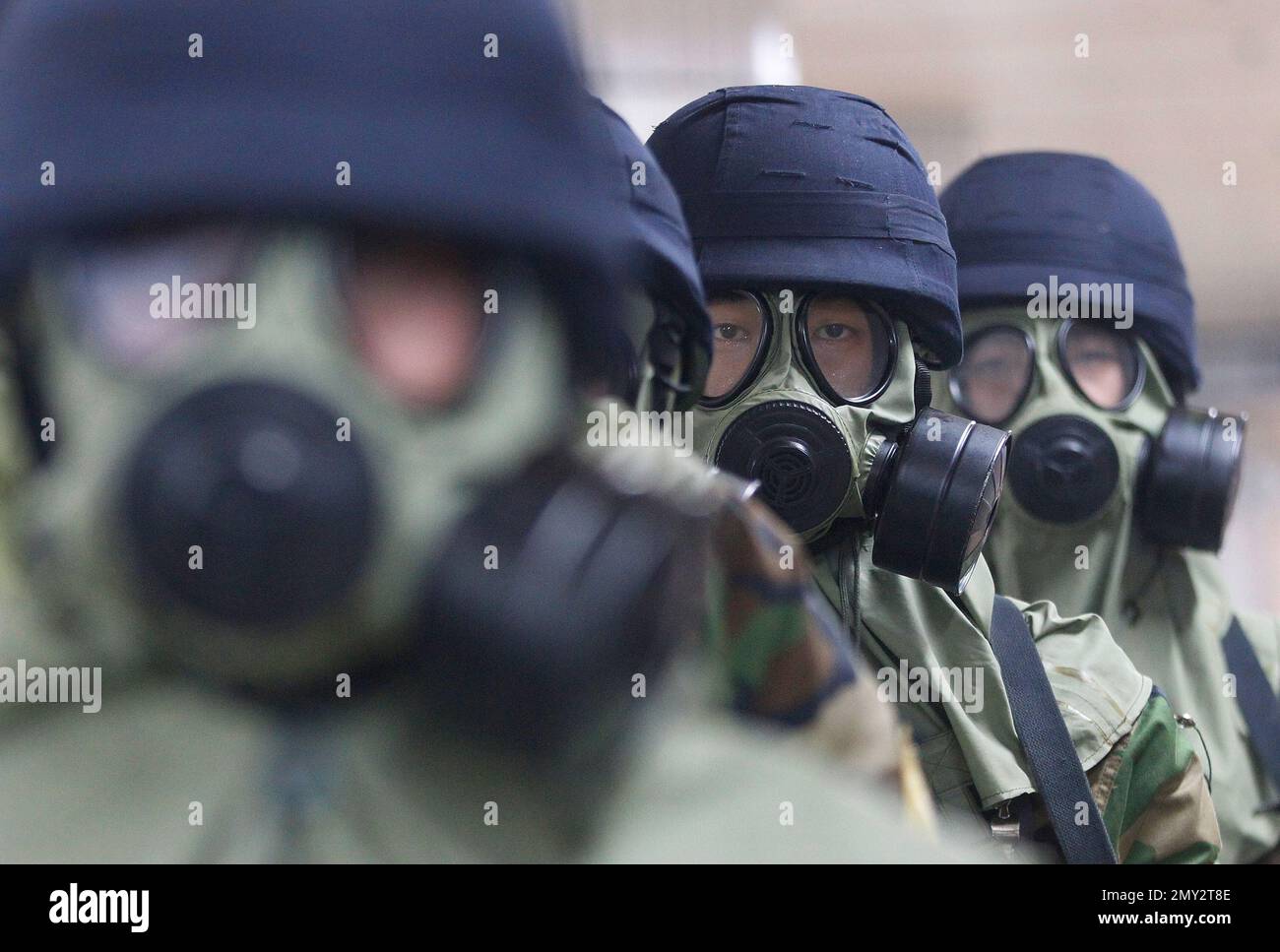 South Korean police officers wearing gas masks conduct an anti-terror ...