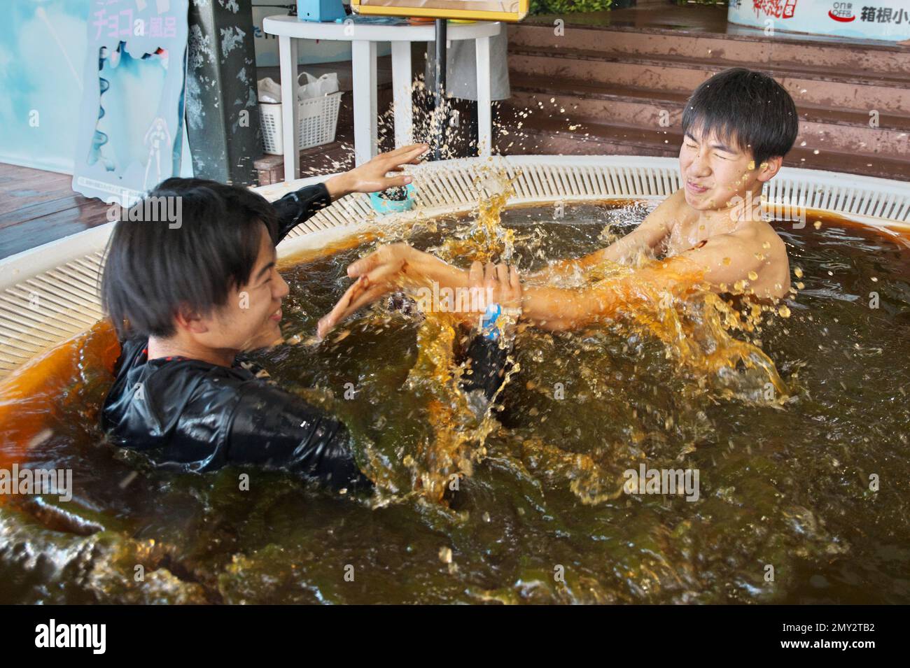 Hakone, Japan. 04th Feb, 2023. Bathers enjoy in a chocolate bath at the ...