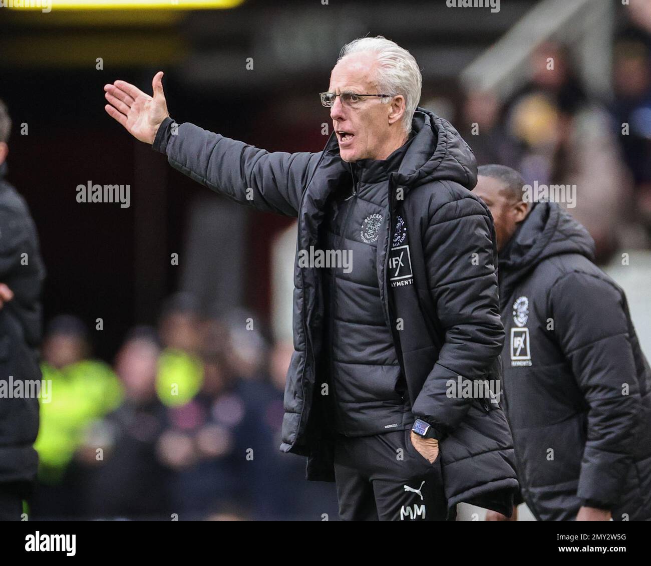 Mick McCarthy manager of Blackpool gives his team instructions during ...