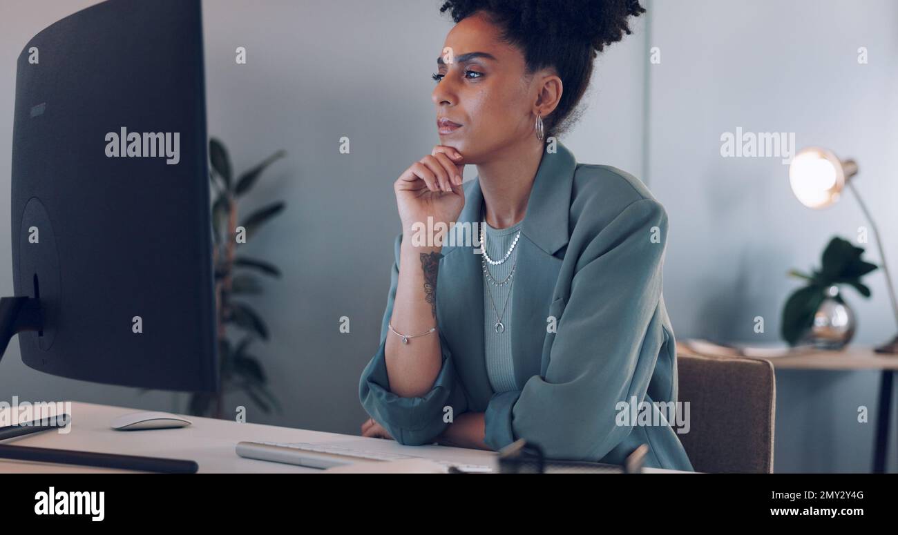 Computer, thinking and black woman typing in office writing email at ...