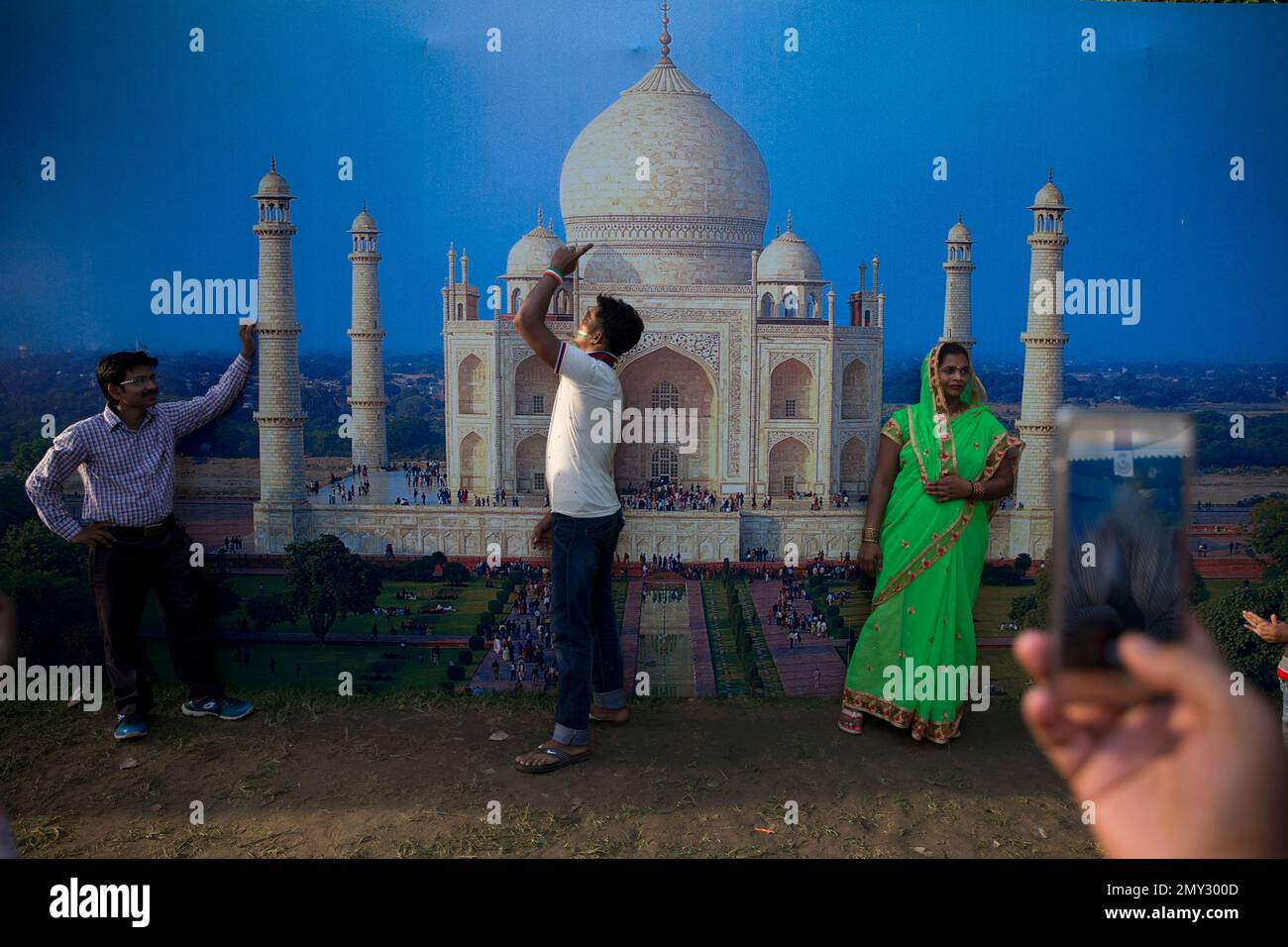 In this Monday, Aug. 15, 2016 photo, Indians get themselves ...