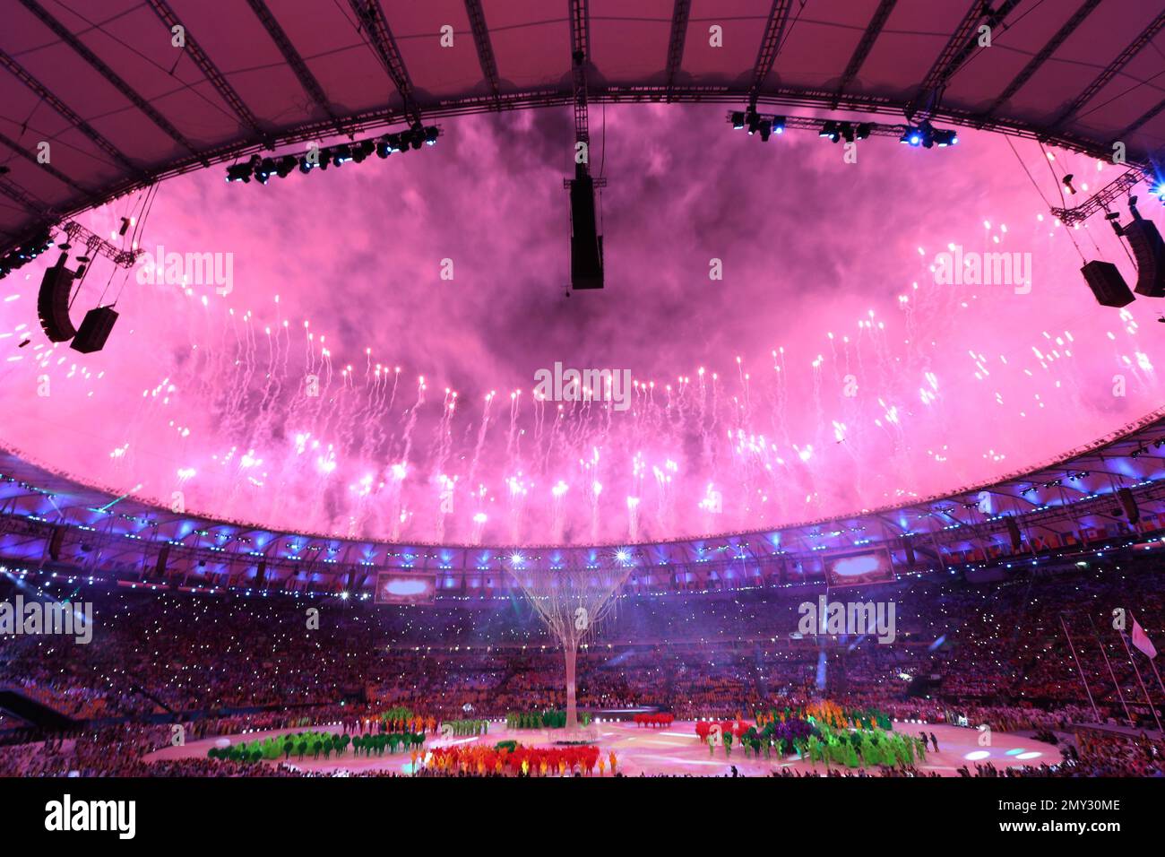 Fireworks goes off after the Olympic flame was extinguished during the closing ceremony in the ...