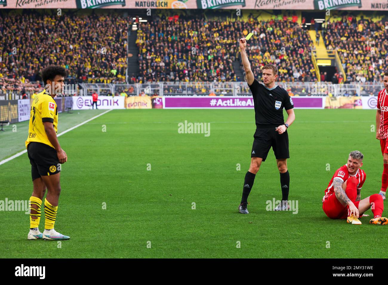 DORTMUND, GERMANY - FEBRUARY 4: Yellow card for Karim Adeyemi of ...