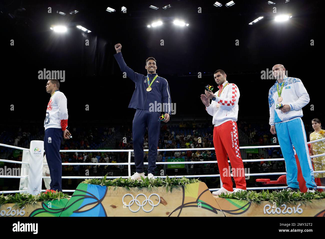 France's Tony Victor James Yoka, second from left, celebrates after ...