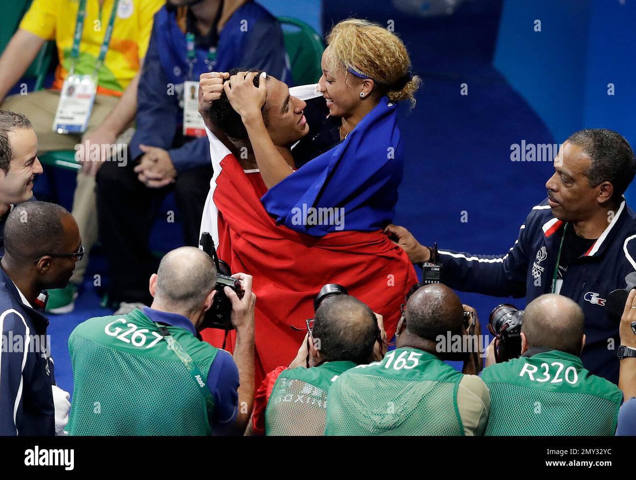 France's Tony Victor James Yoka, left, celebrates his gold medal for ...