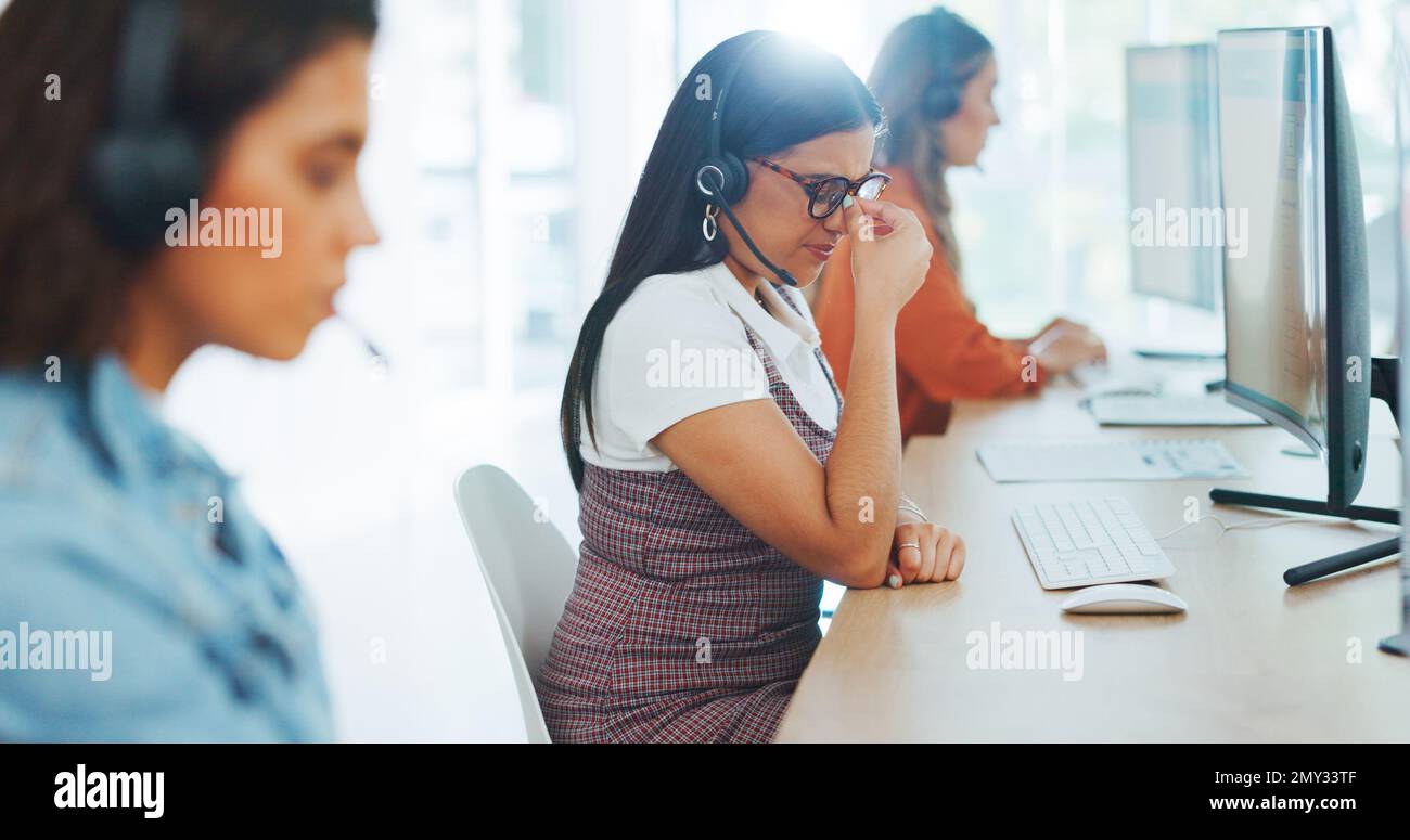Headache, stress and woman call center consultant working with a ...