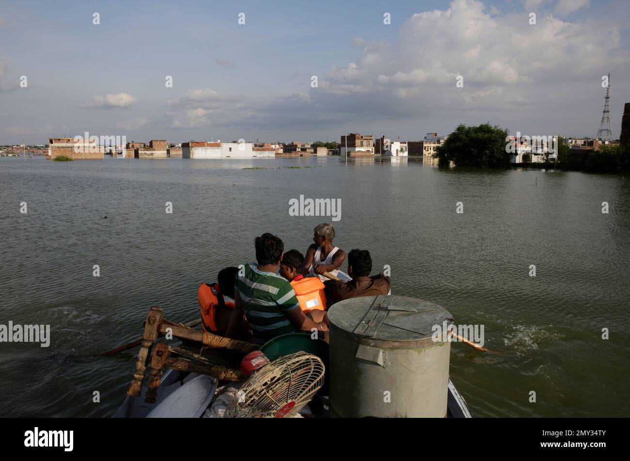 Rescuers shift residents to safer places following floods in the River ...