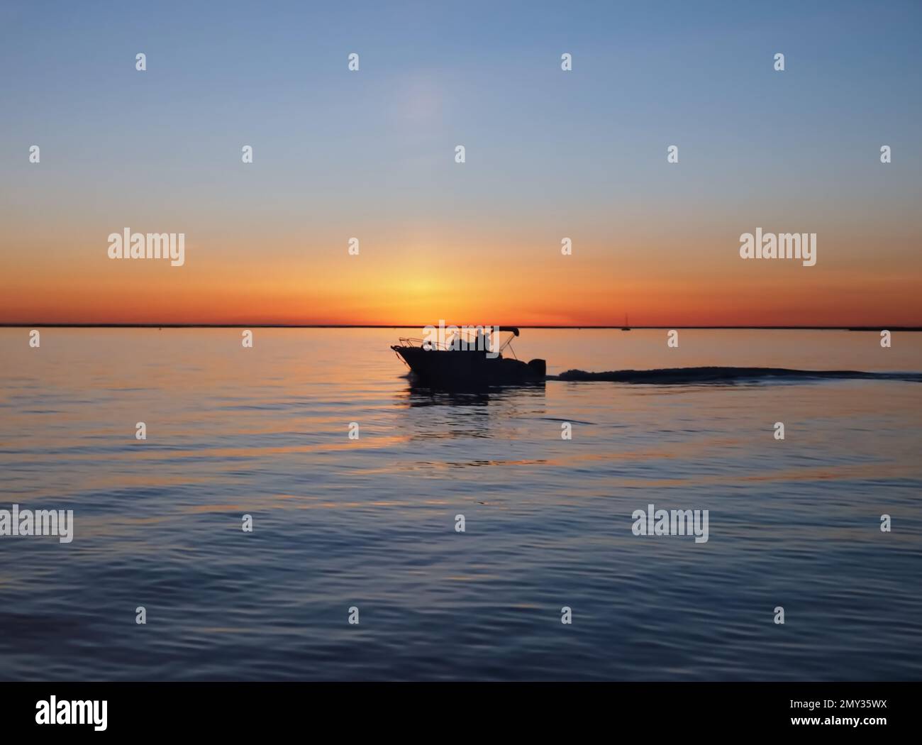 Awesome sunset above the ocean Stock Photo - Alamy