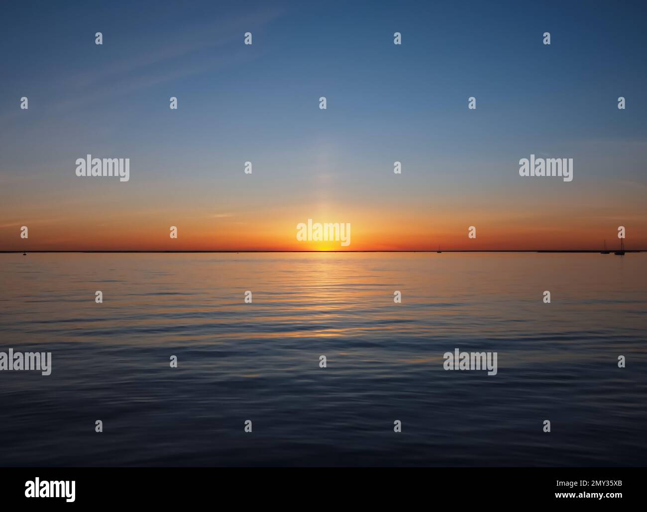 Awesome sunset above the ocean Stock Photo - Alamy