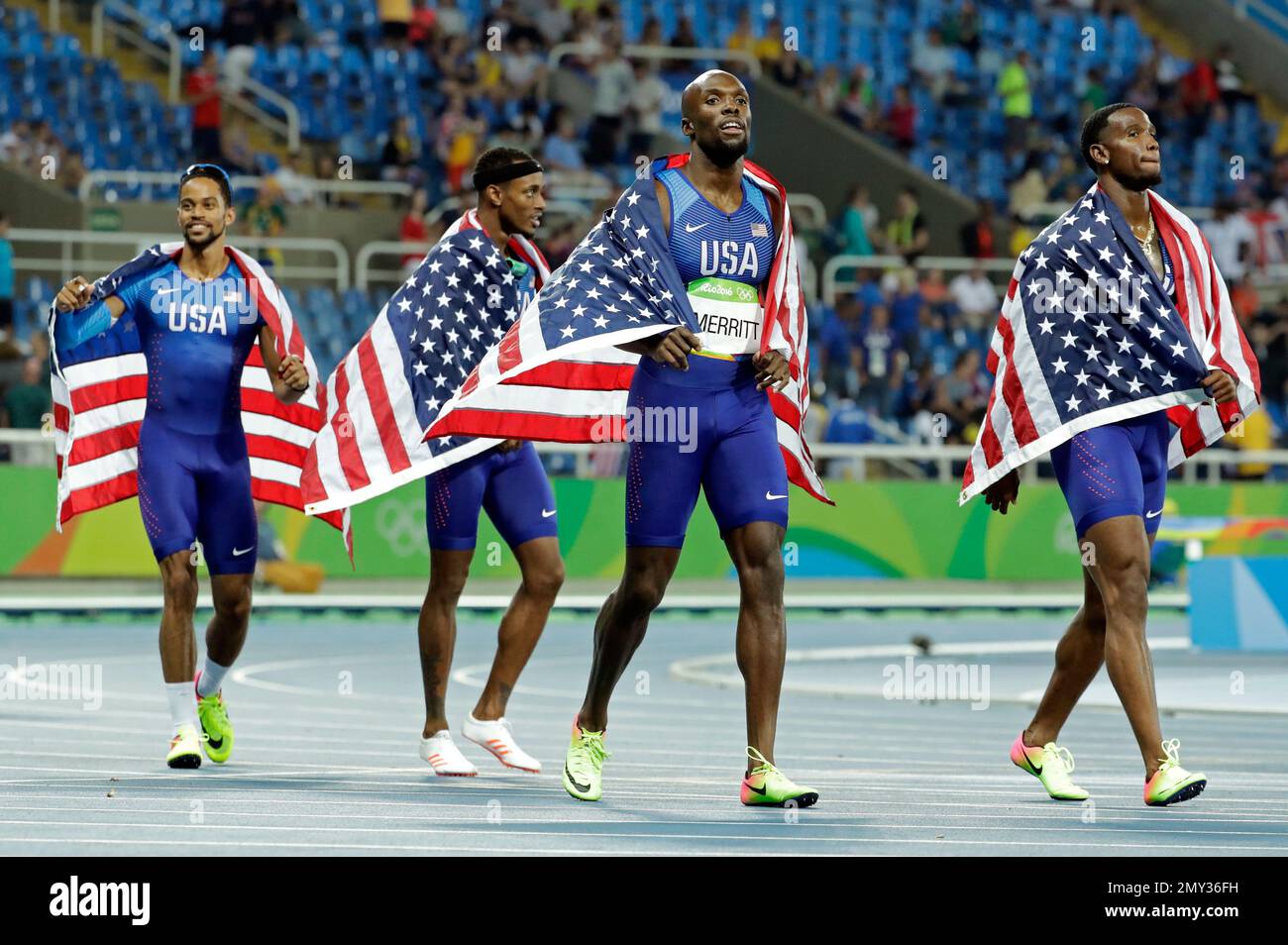 The United States men's 4x400 meter relay team, Arman Hall, Tony McQuay ...