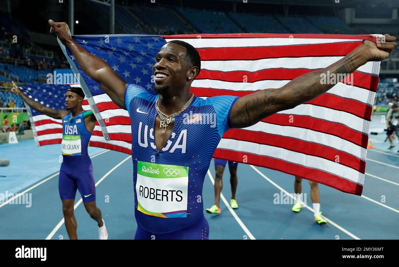 United States' Tony McQuay, left, and Gil Roberts celebrate winning the ...