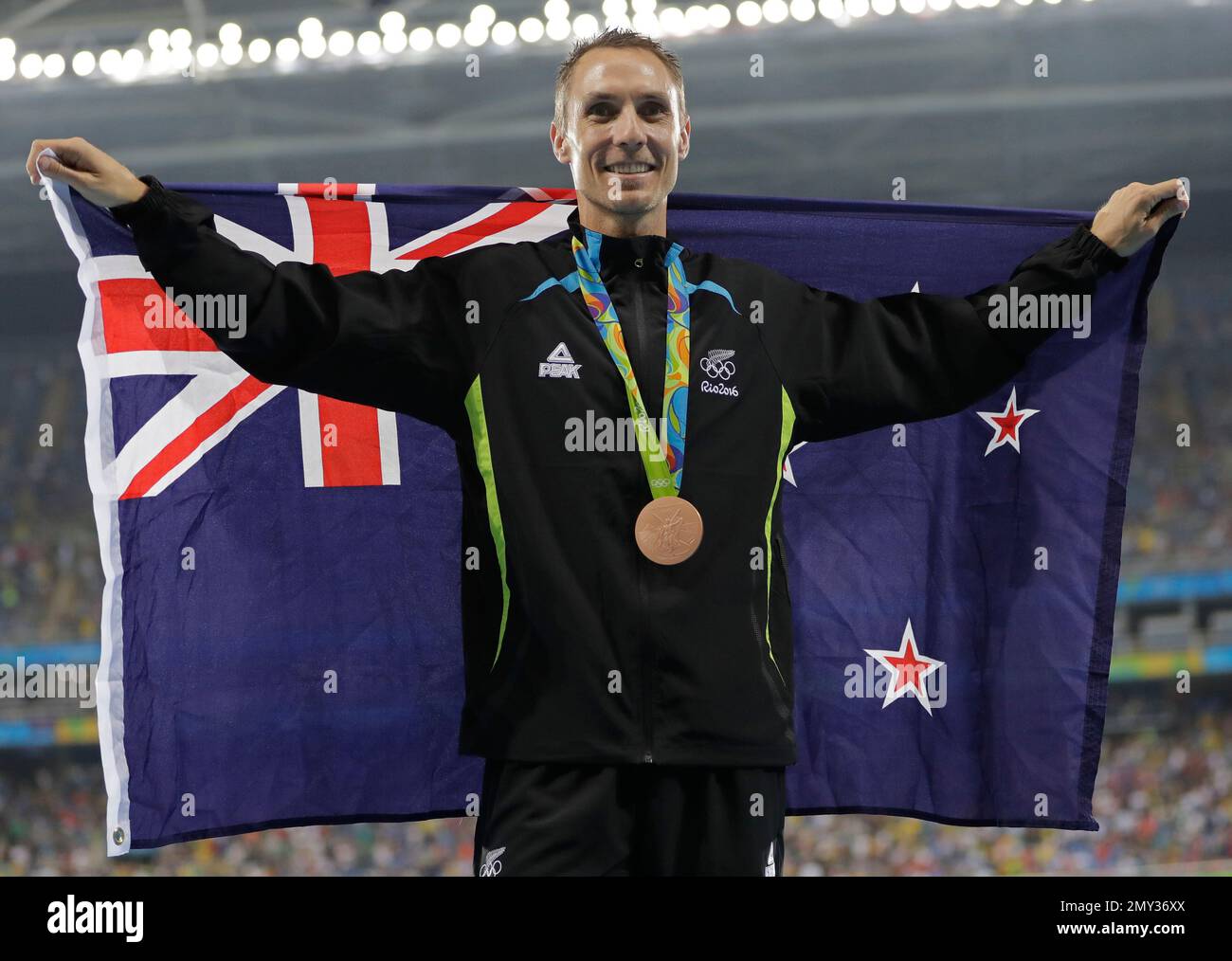 New Zealand's Nicholas Willis celebrates winning the bronze in the men ...