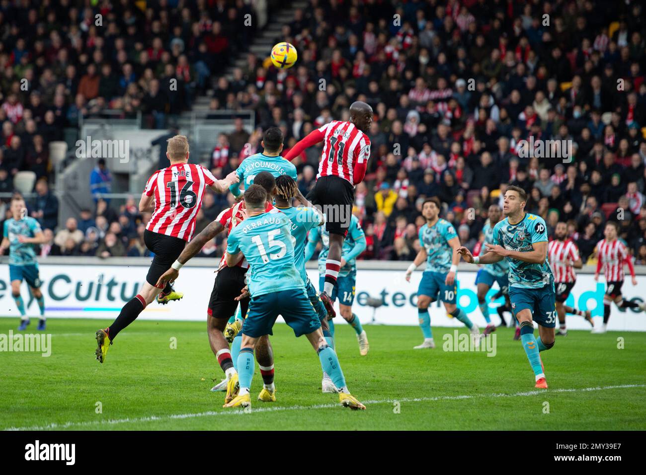 Ben Mee of Brentford rises to score the first goal during the Premier ...