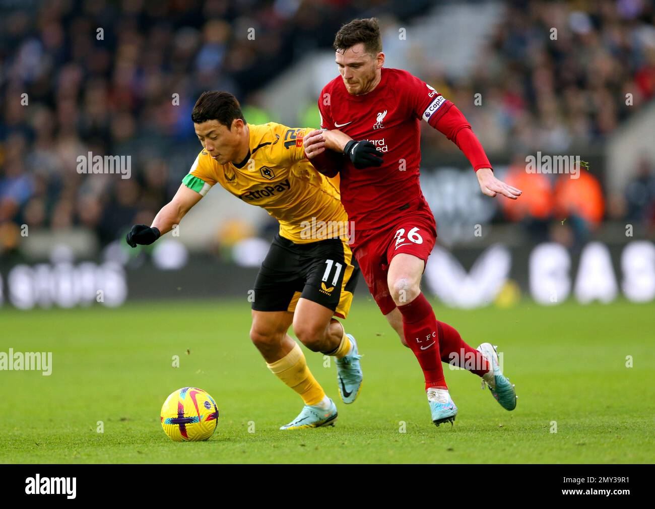 Wolverhampton Wanderers' Hwang Hee-chan (left) and Liverpool's Andrew ...