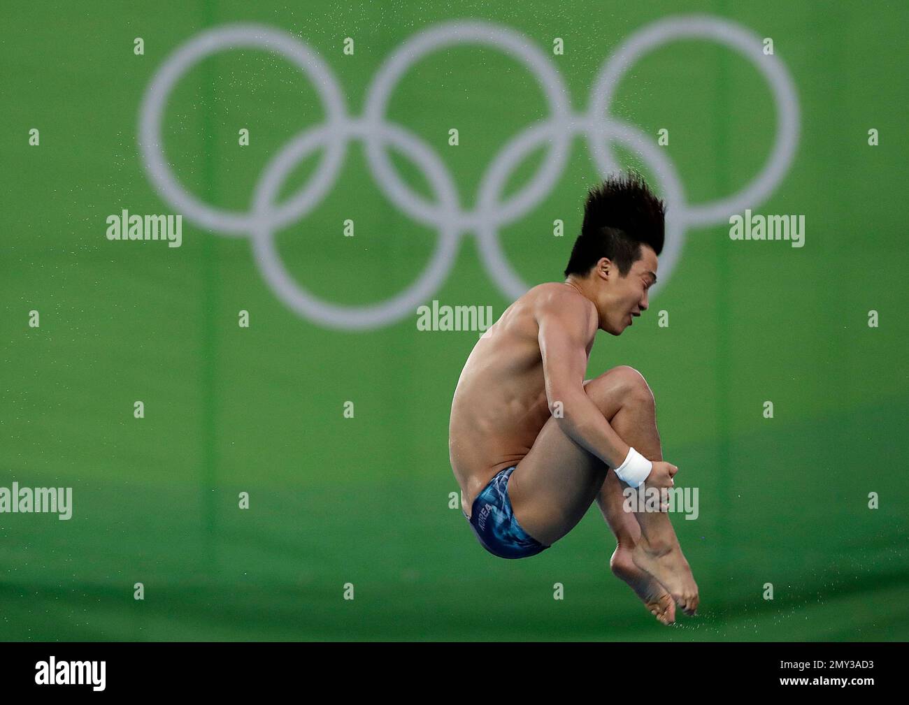 South Korea's Woo Haram competes during the men's 10-meter platform ...