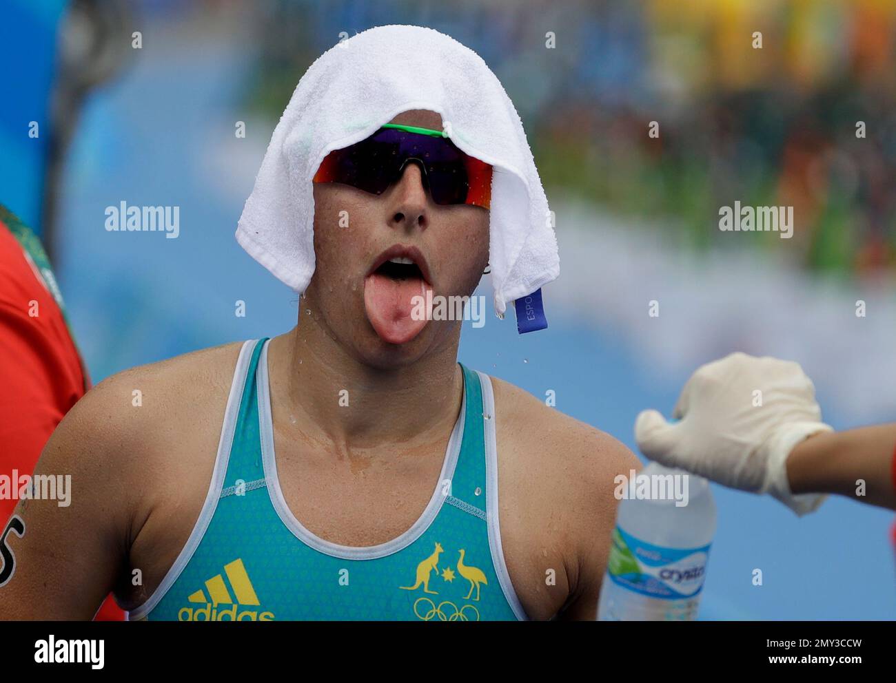Erin Densham of Australia reacts after finishing the women's triathlon ...