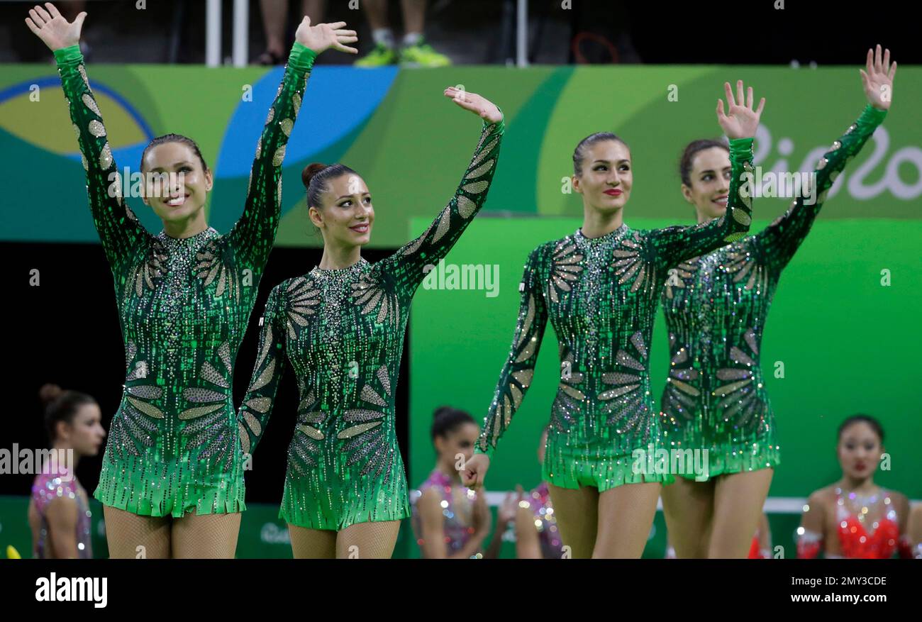 Bulgarian gymnasts wave at the end of the rhythmic gymnastics group all ...