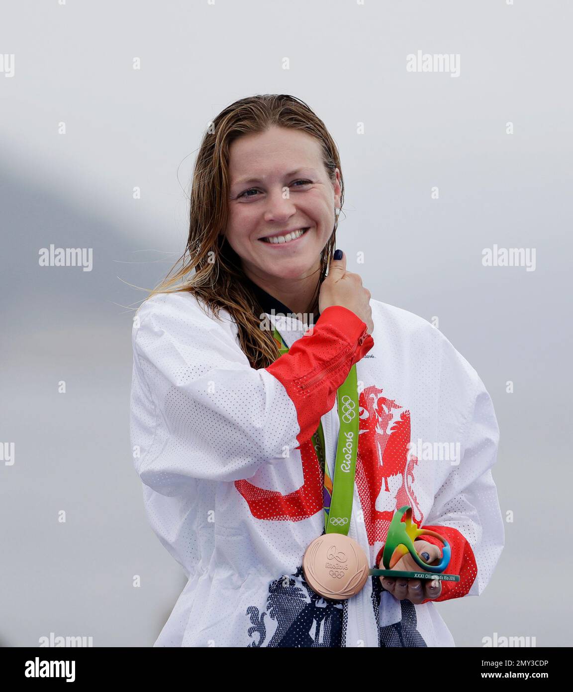 Vicky Holland, of Great Britain, stands on the podium after receiving ...