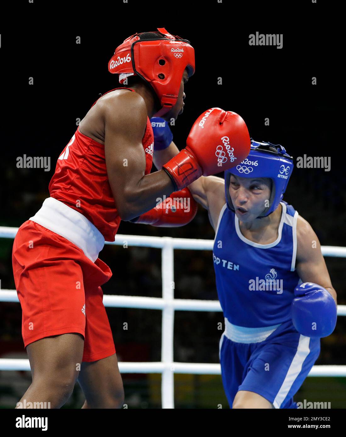 France's Sarah Ourahmoune, right, fights Britain's Nicola Adams during ...