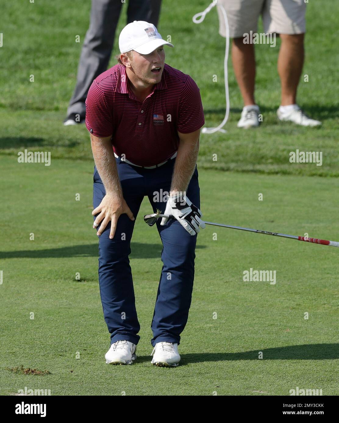 Brad Dalke watches his approach shot on the 11th green during a semi ...