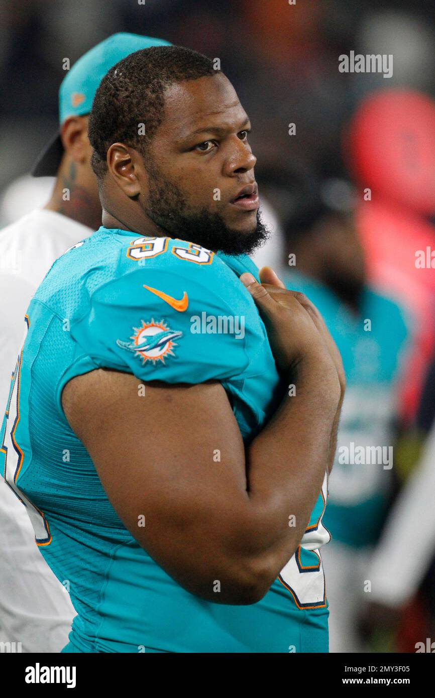 Miami Dolphins defensive tackle Ndamukong Suh (93) stands on the ...