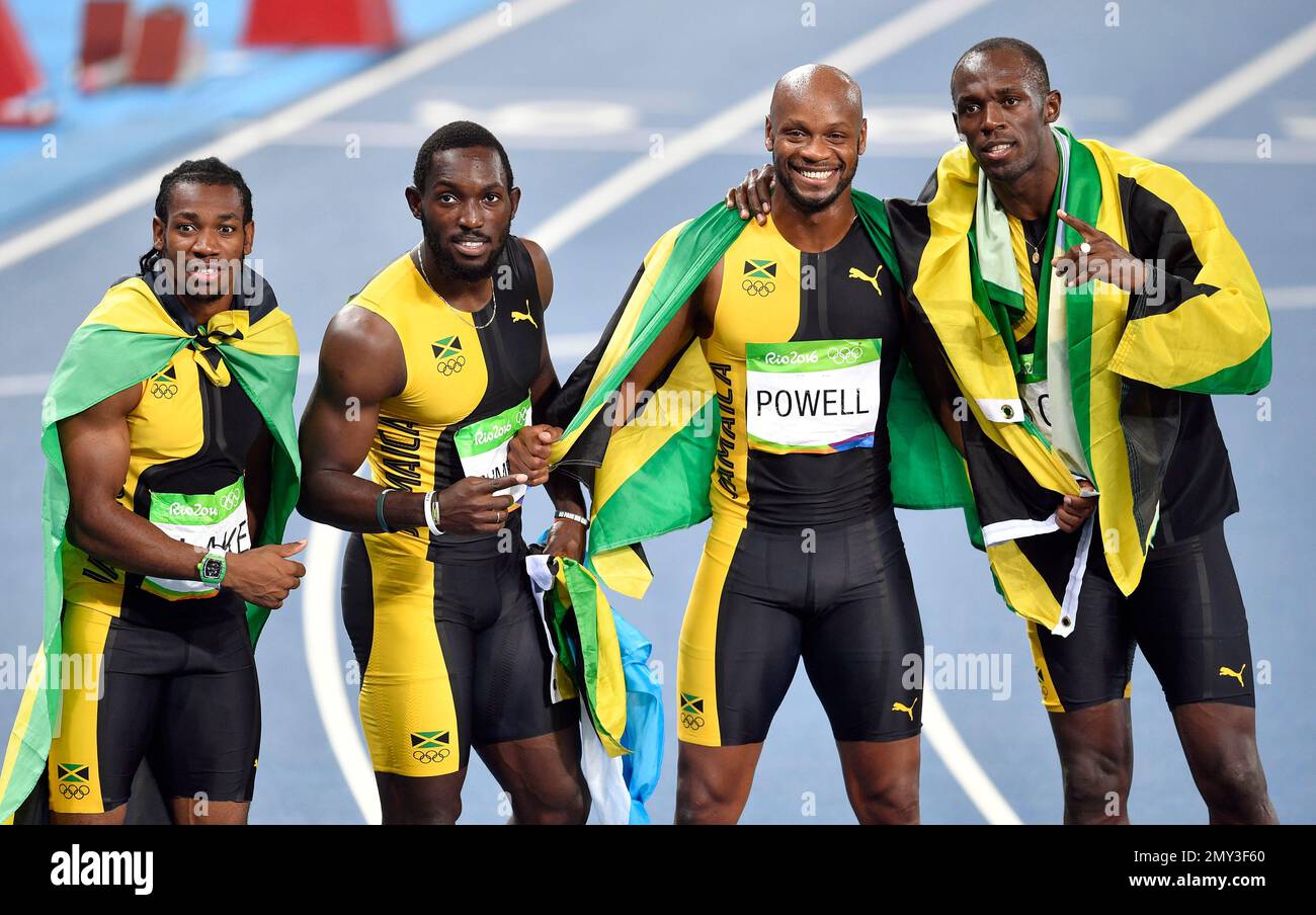 The Jamaica team from left, Yohan Blake, Nickel Ashmeade, Asafa Powell and Usain Bolt celebrate ...