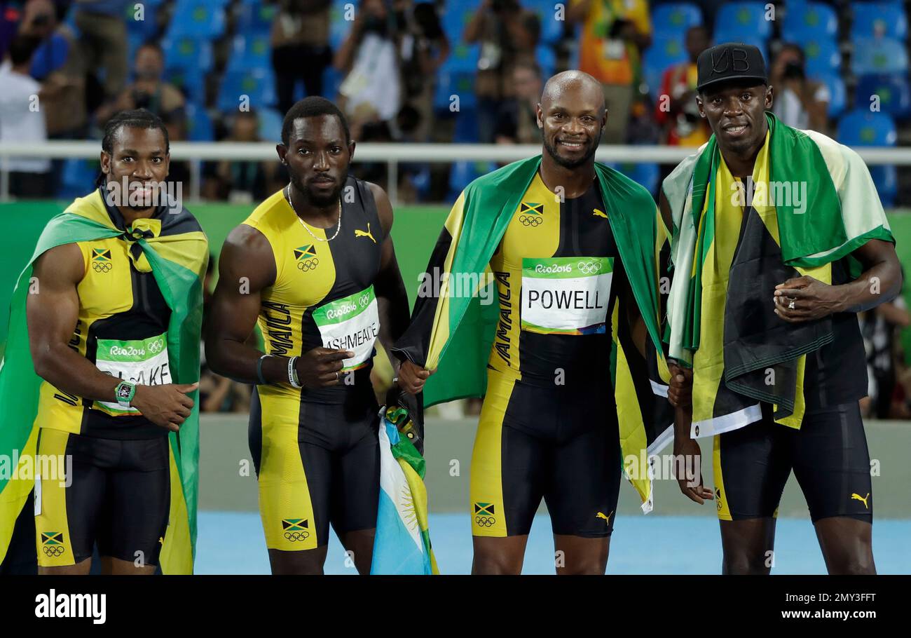 Jamaica's Asafa Powell, second right, Yohan Blake, left, Nickel Ashmeade, second left, and Usain ...