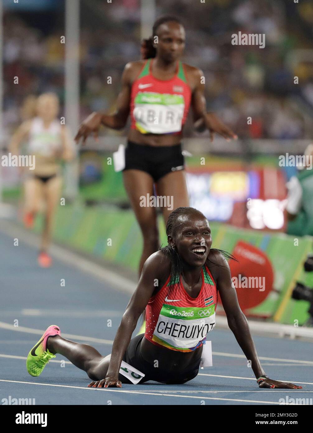 Kenya's Vivian Jepkemoi Cheruiyot celebrates winning the gold medal and ...