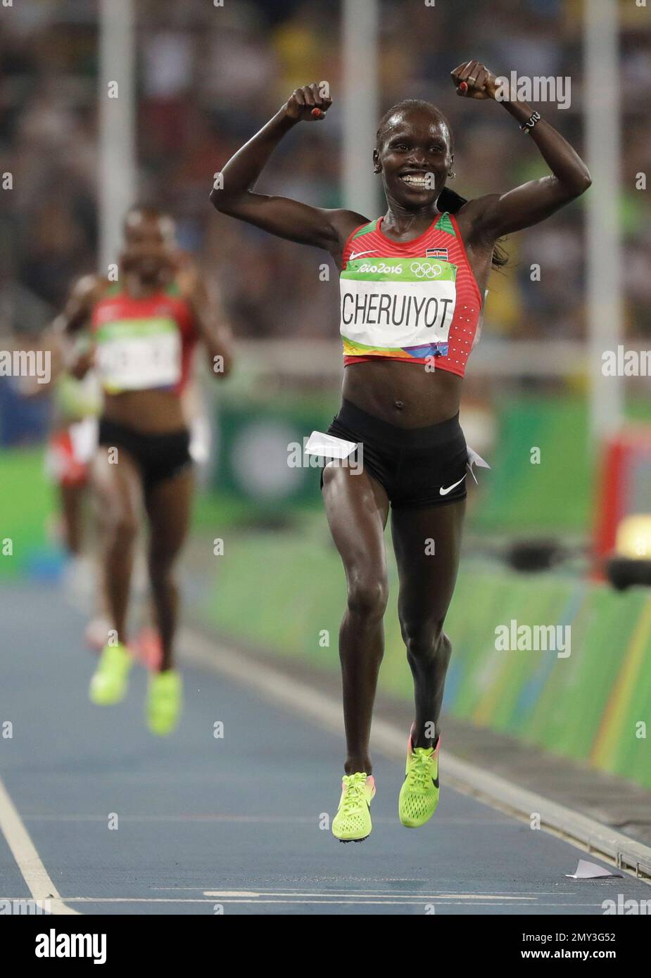 Kenya's Vivian Jepkemoi Cheruiyot celebrates winning the gold medal and ...