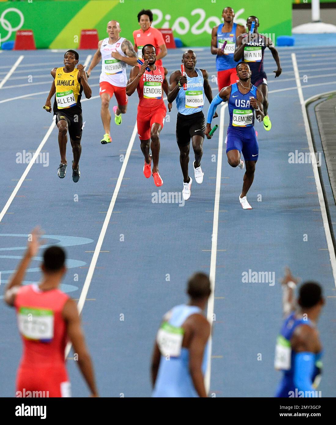 United States' Kyle Clemons, right, competes in a men's 4x400-meter ...