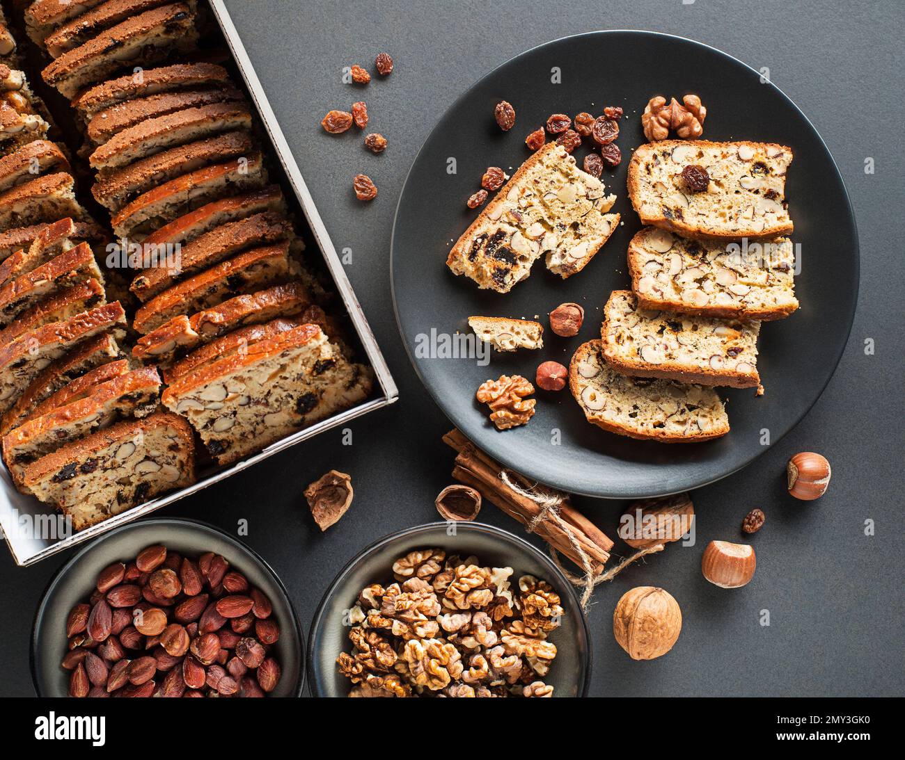 Tasty traditional homemade biscotti biscuits on black table background ...