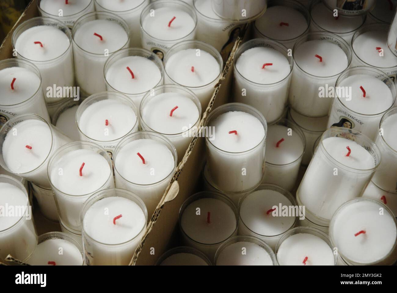 New candles packed in a katon Stock Photo - Alamy