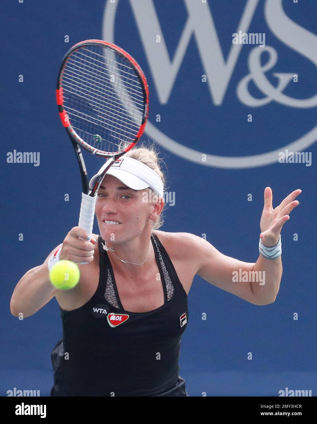 Timea Babos, of Hungary, returns to Garbine Muguruza, of Spain, during ...