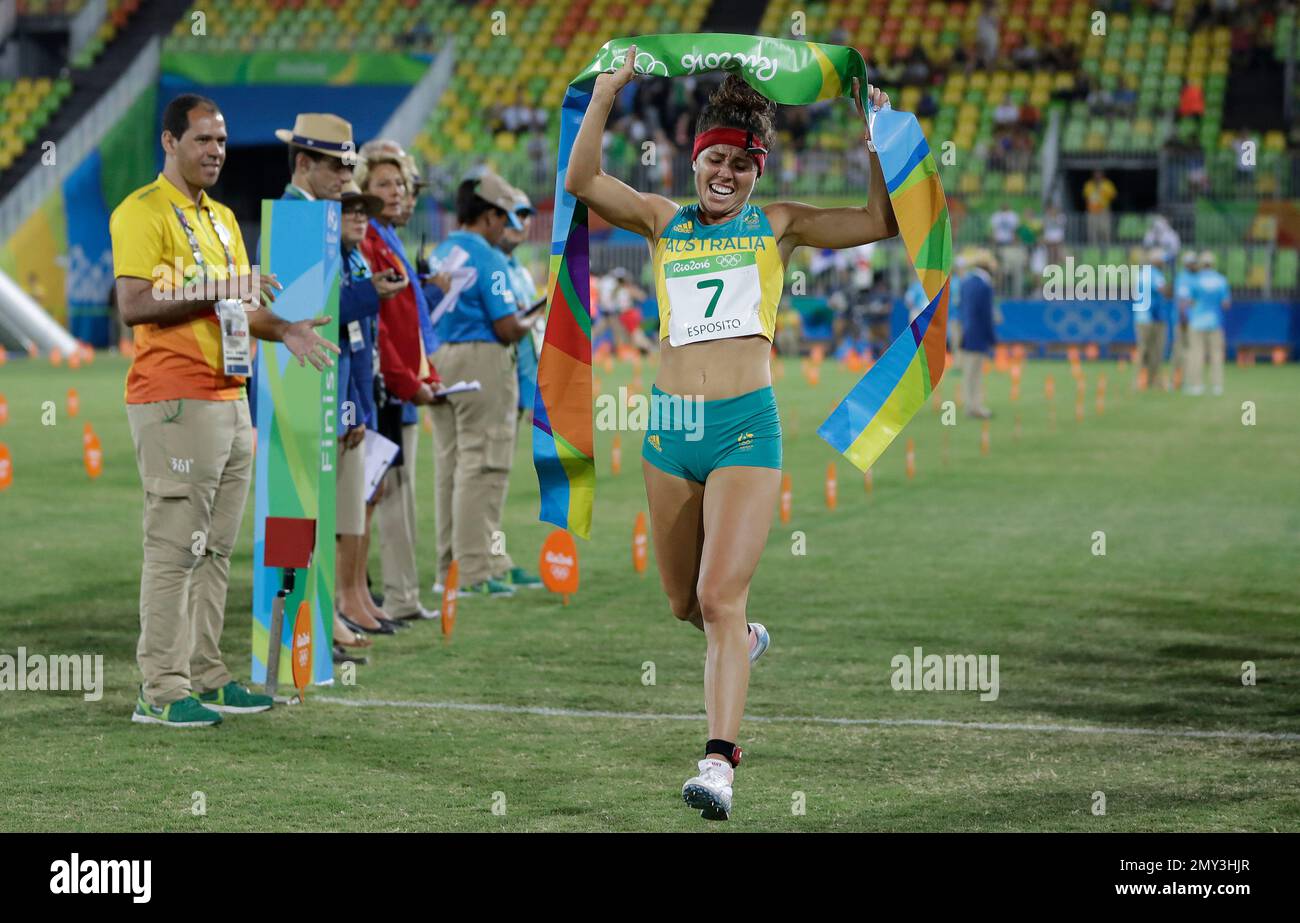 Chloe Esposito of Australia crosses the finish line to win the gold ...