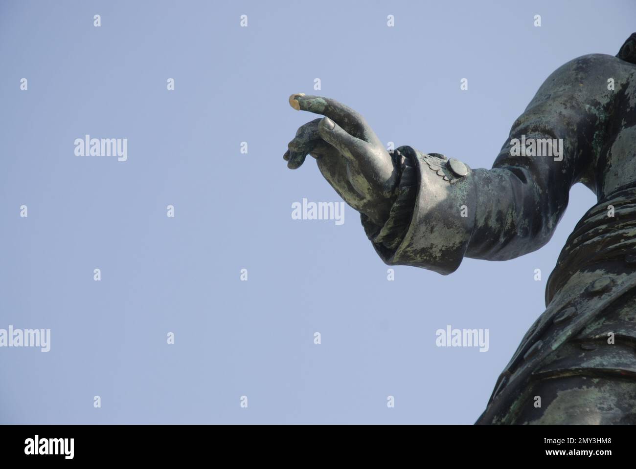 Figure points a finger in a cardinal direction Stock Photo - Alamy